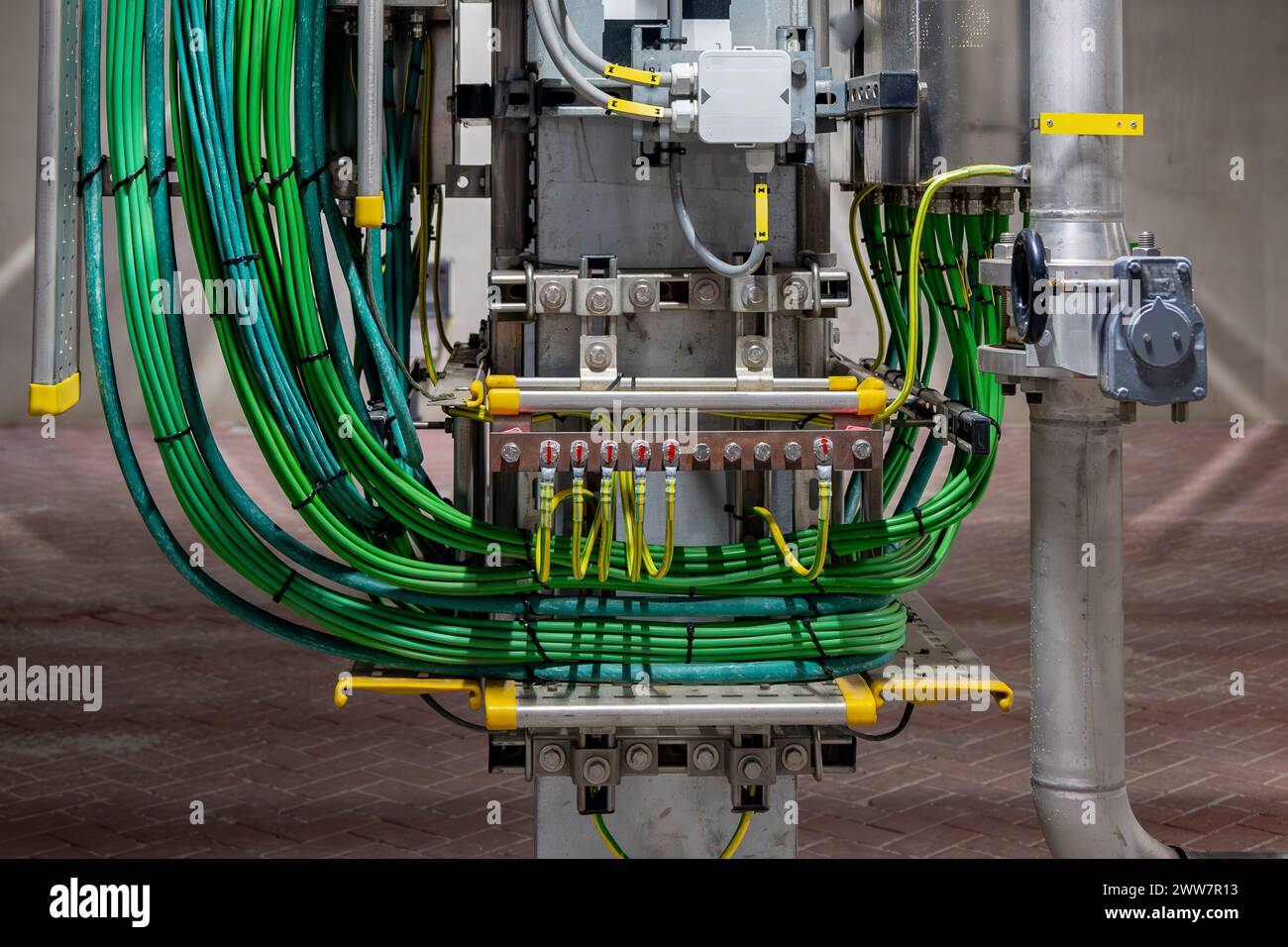 Picture of yellow colored electrical grounding cables and green signal ...