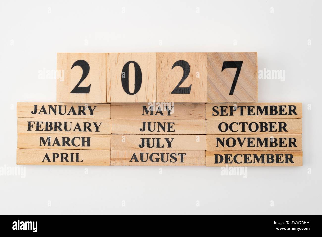 Year 2027 written on wooden cubes on top of the months of the year ...