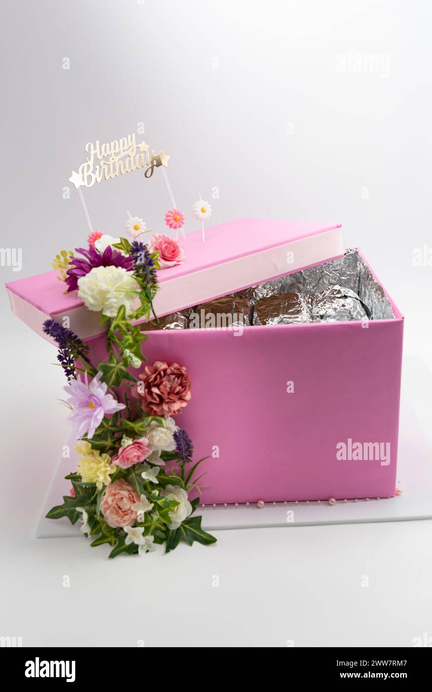 Fake cake or Gift Box Cake in pink and white, decorated with a flower ...