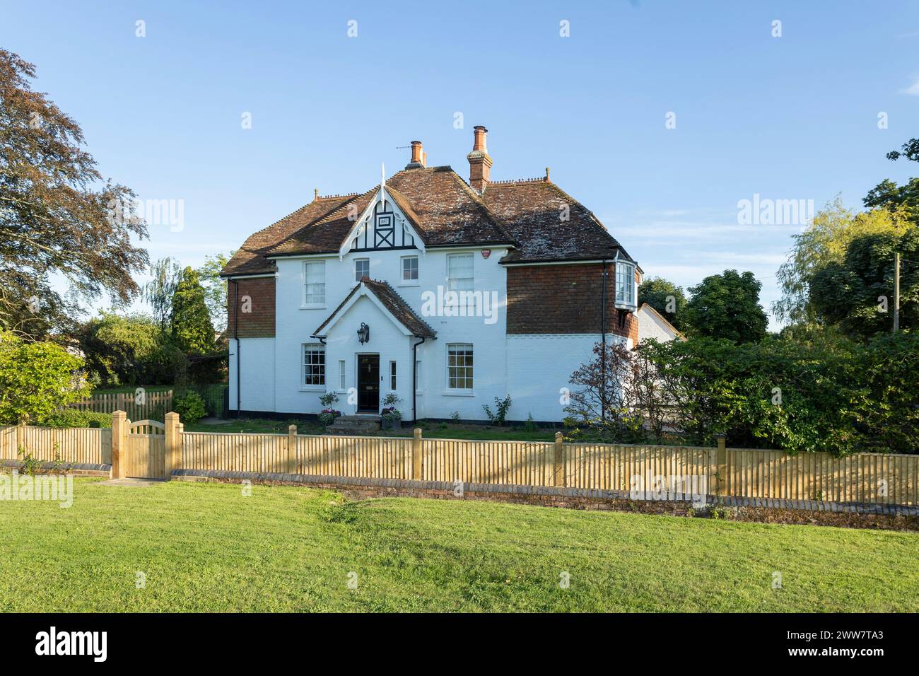 Pretty cottage on a village green, Kent, UK Stock Photo - Alamy