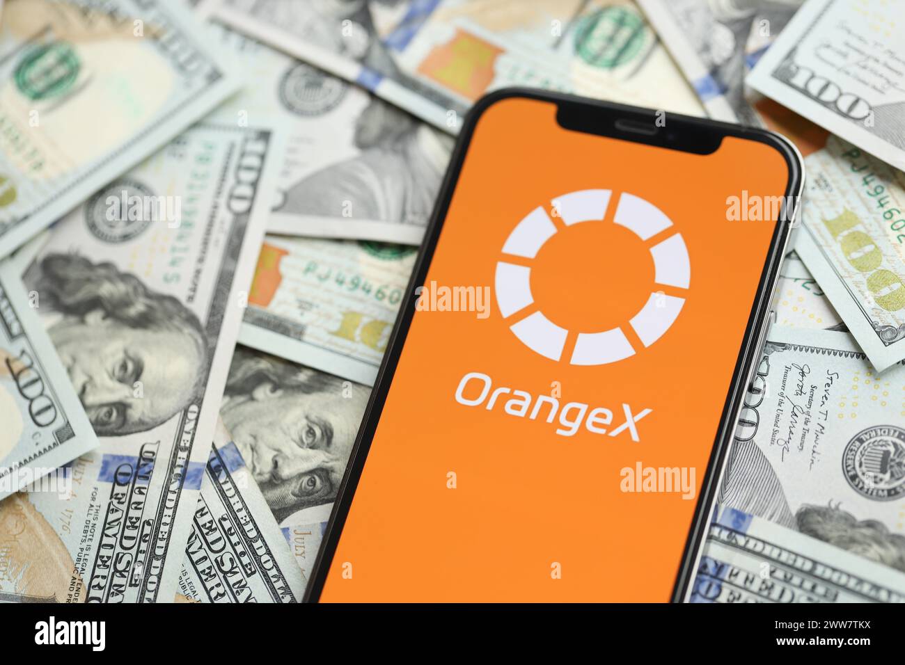 KYIV, UKRAINE - MARCH 15, 2024 OrangeX logo on iPhone display screen ...