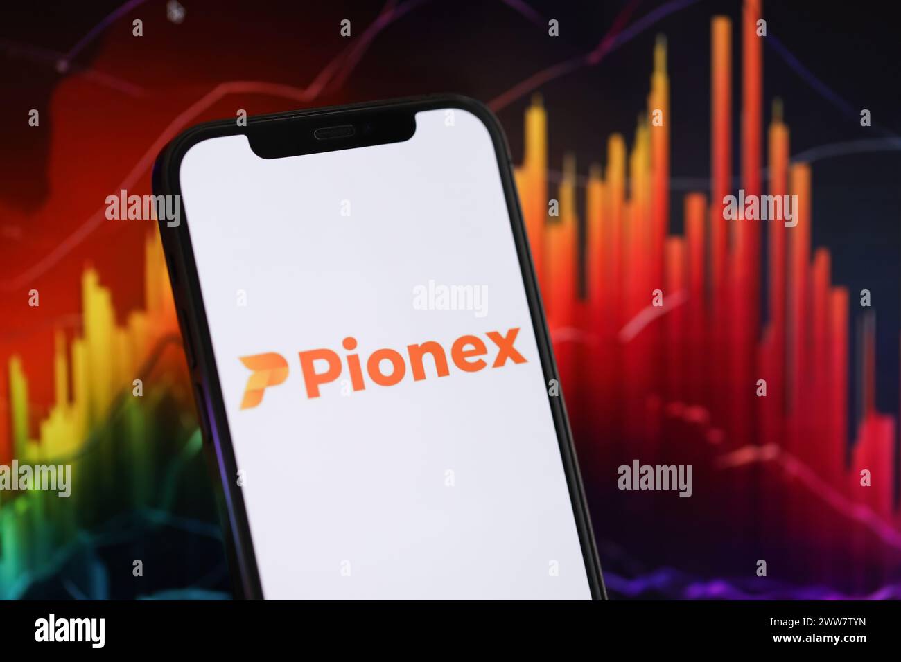 KYIV, UKRAINE - MARCH 15, 2024 Pionex logo on iPhone display screen and ...