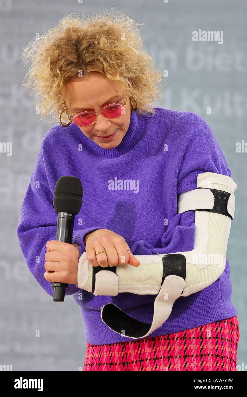 Leipzig, Germany. 22nd Mar, 2024. German actress Katja Riemann removes ...