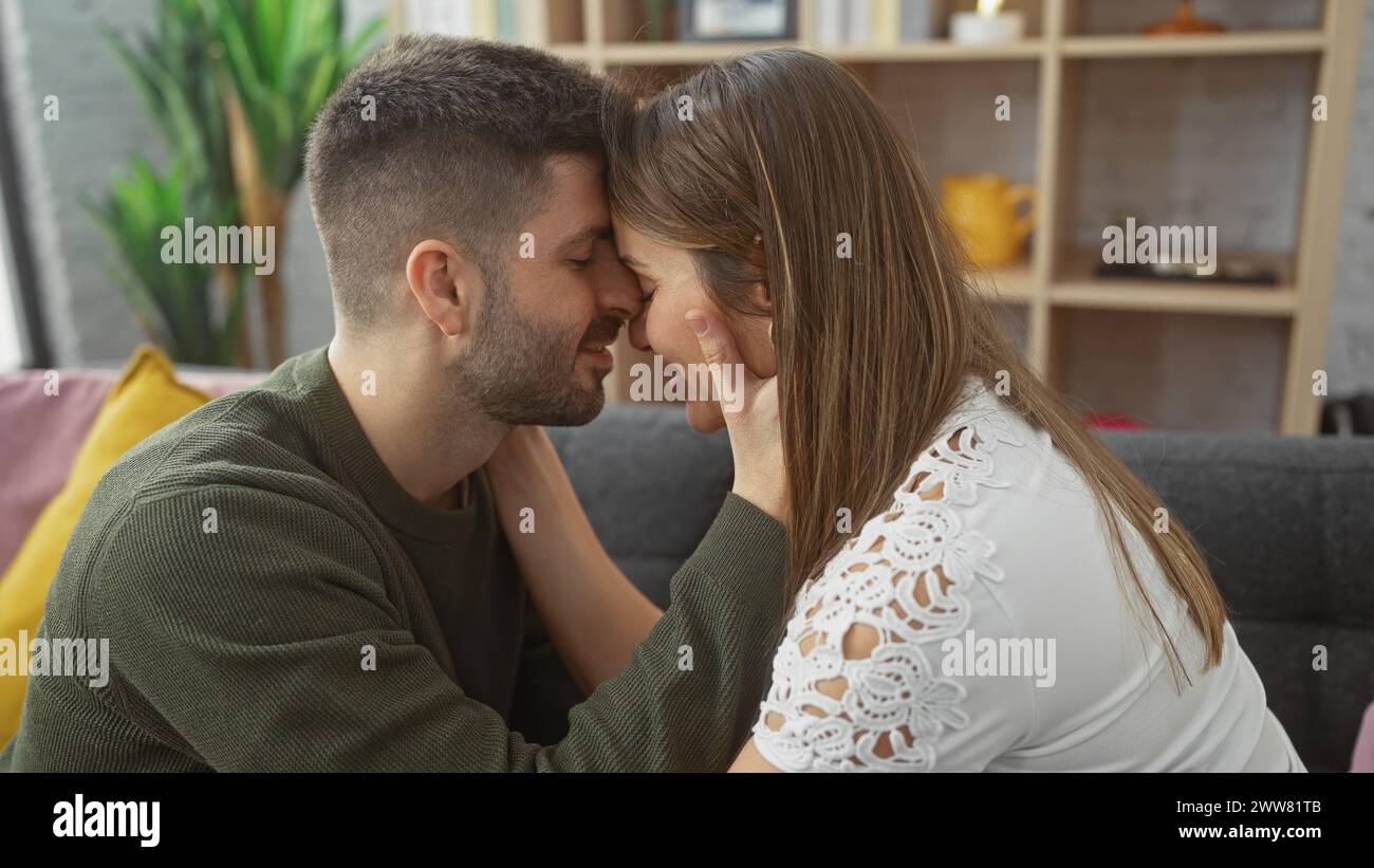 A man and woman in a loving embrace at home, hinting at a strong ...