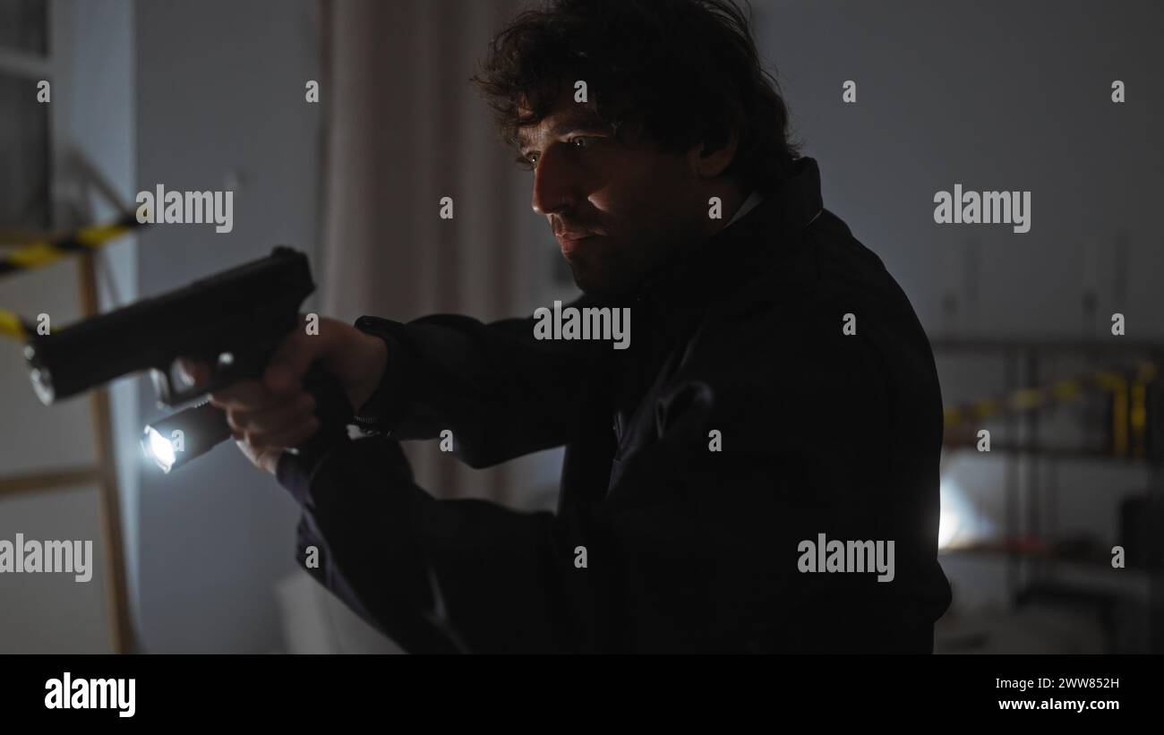 Man detective with pistol flashlight searching indoors at crime scene ...