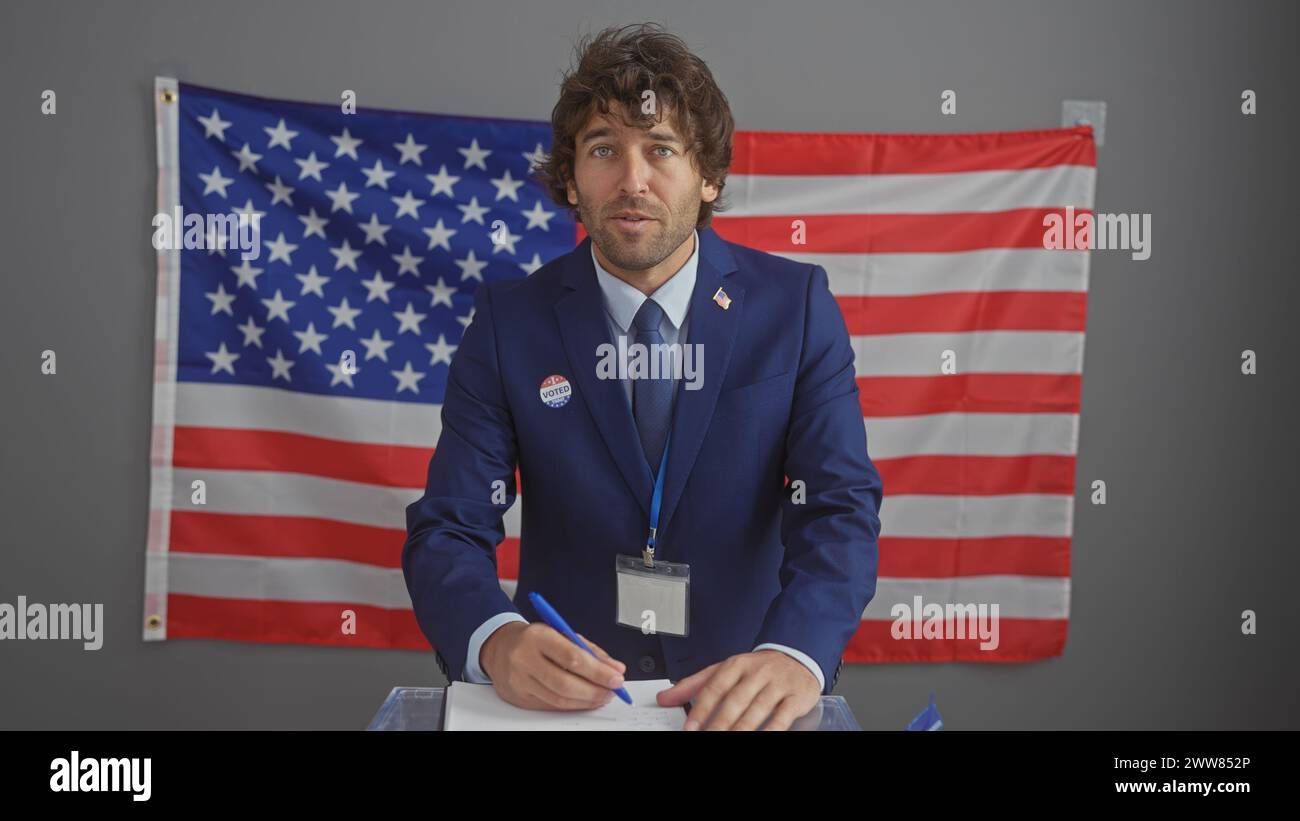 Handsome hispanic man with a beard in a blue suit voting at an american ...
