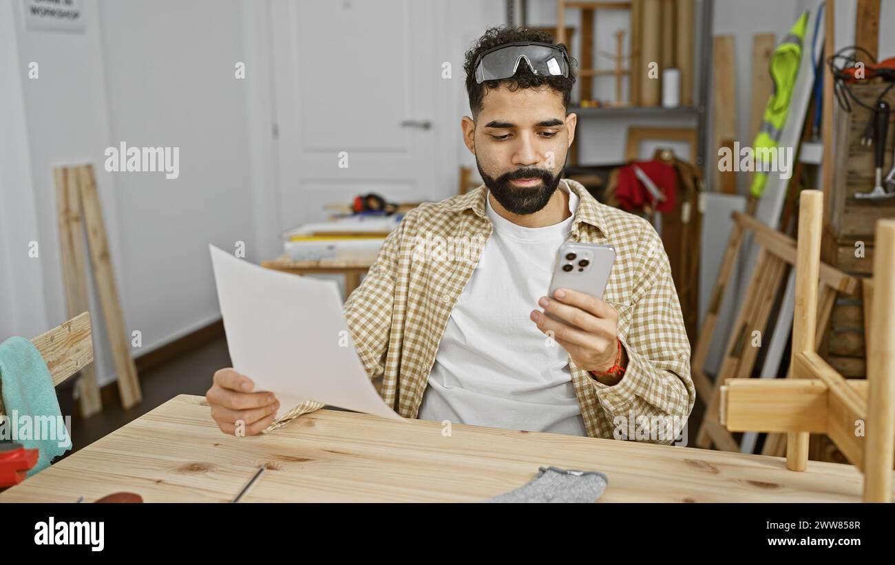 Hispanic man comparing paper document with smartphone information in a ...