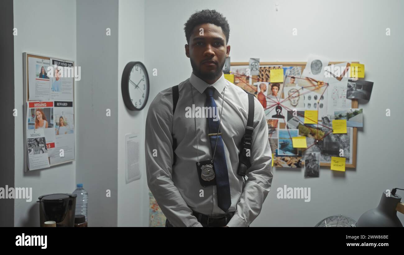 Handsome black man in detective office with evidence board clock and ...