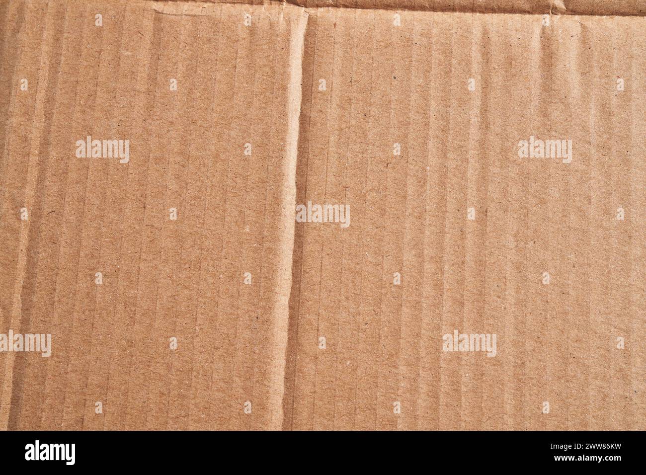 Brown cardboard carton material texture background Stock Photo - Alamy