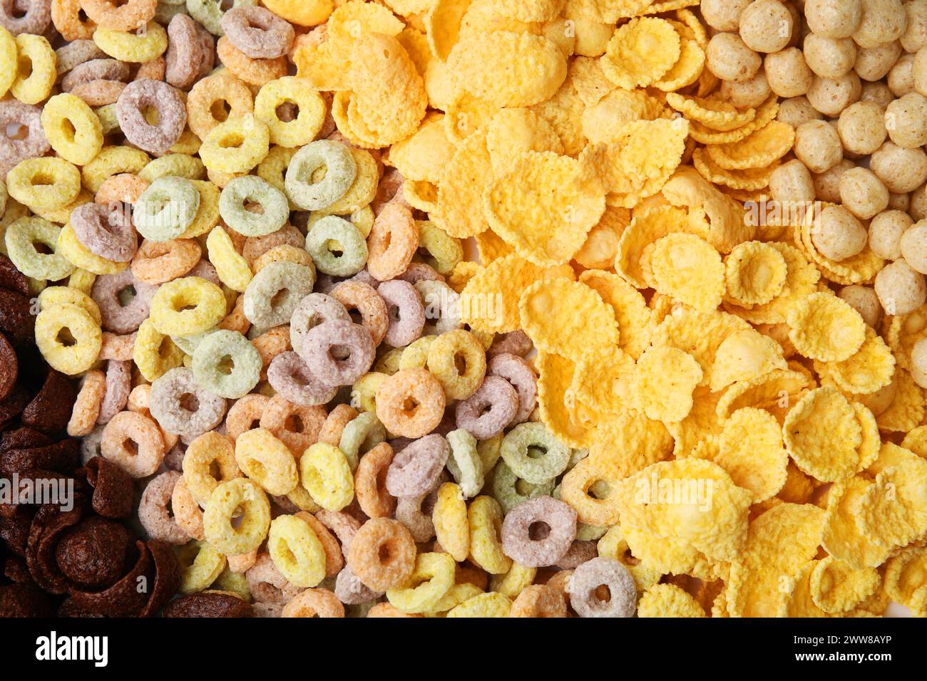 Different types of breakfast cereals as background, top view Stock ...
