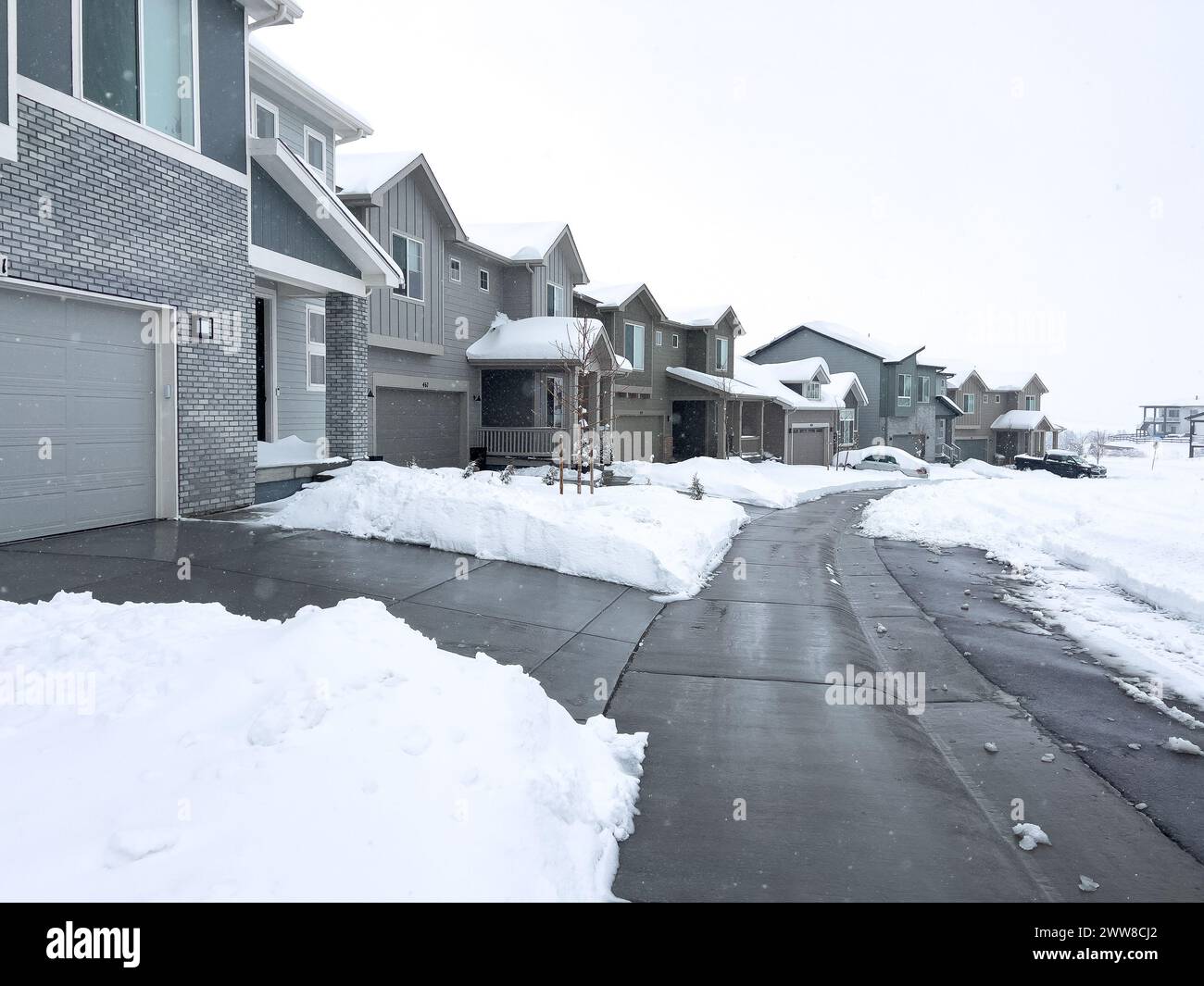 Freshly Shoveled Driveways After Winter Snowfall Stock Photo - Alamy