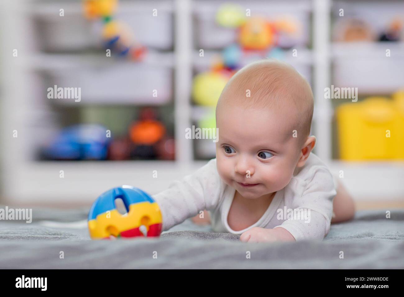 Baby crawling reaching hi-res stock photography and images - Alamy