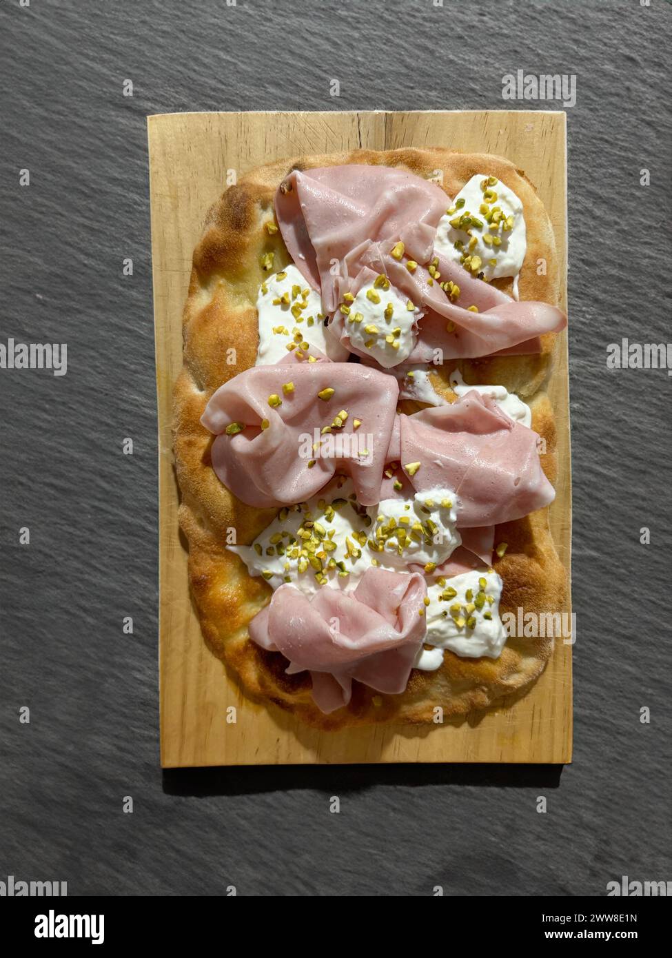 Roman pinsa, variant of the classic Italian pizza topped with ...