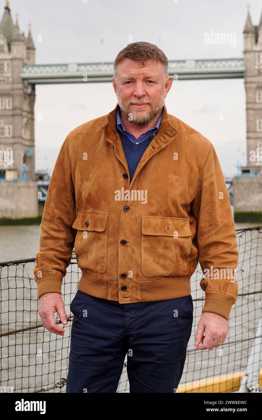 Guy Ritchie attends a photo call for The Ministry of Ungentlemanly ...