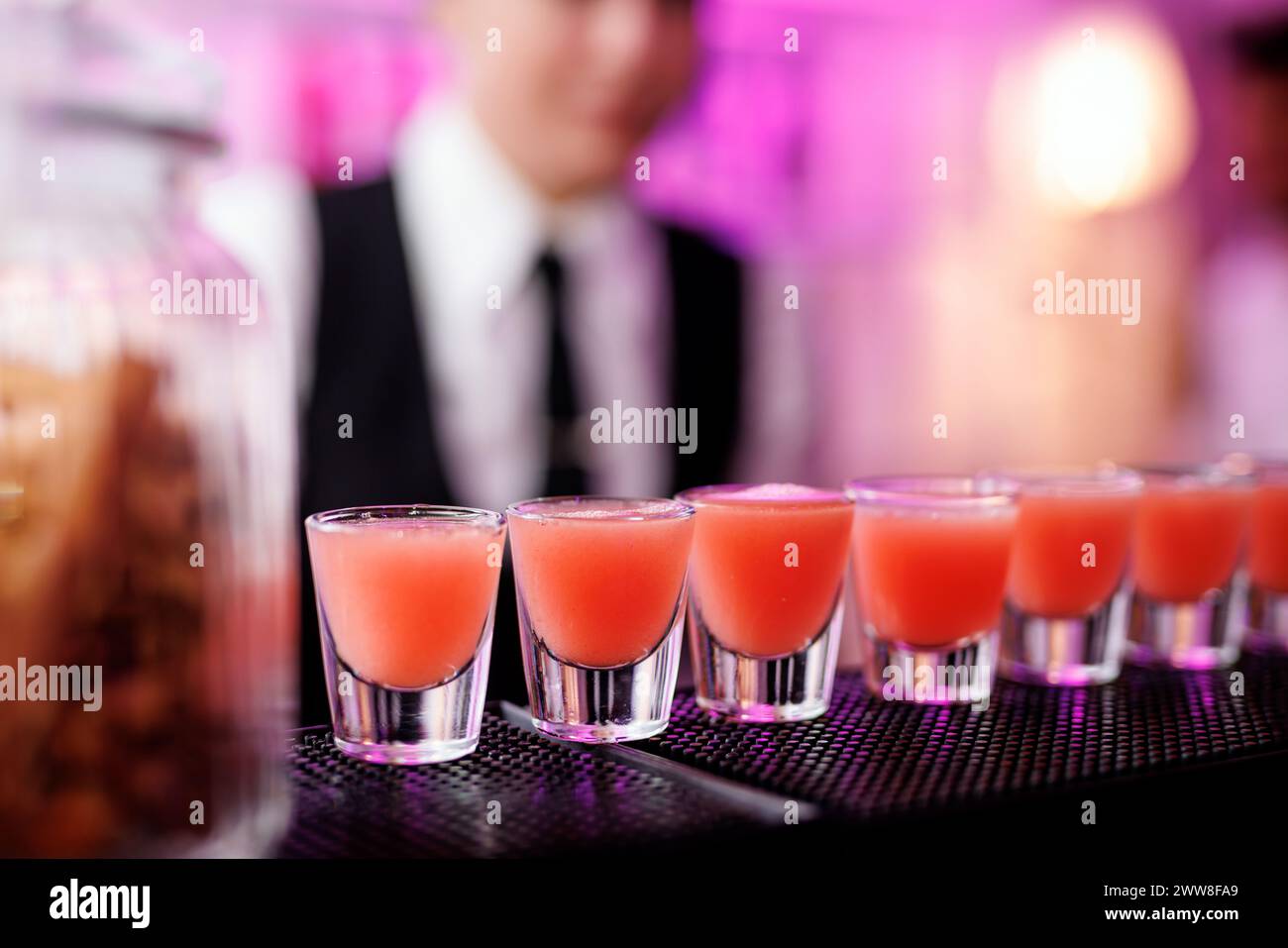 The row of alcohol shots on the bar counter, ready to drink Stock Photo ...
