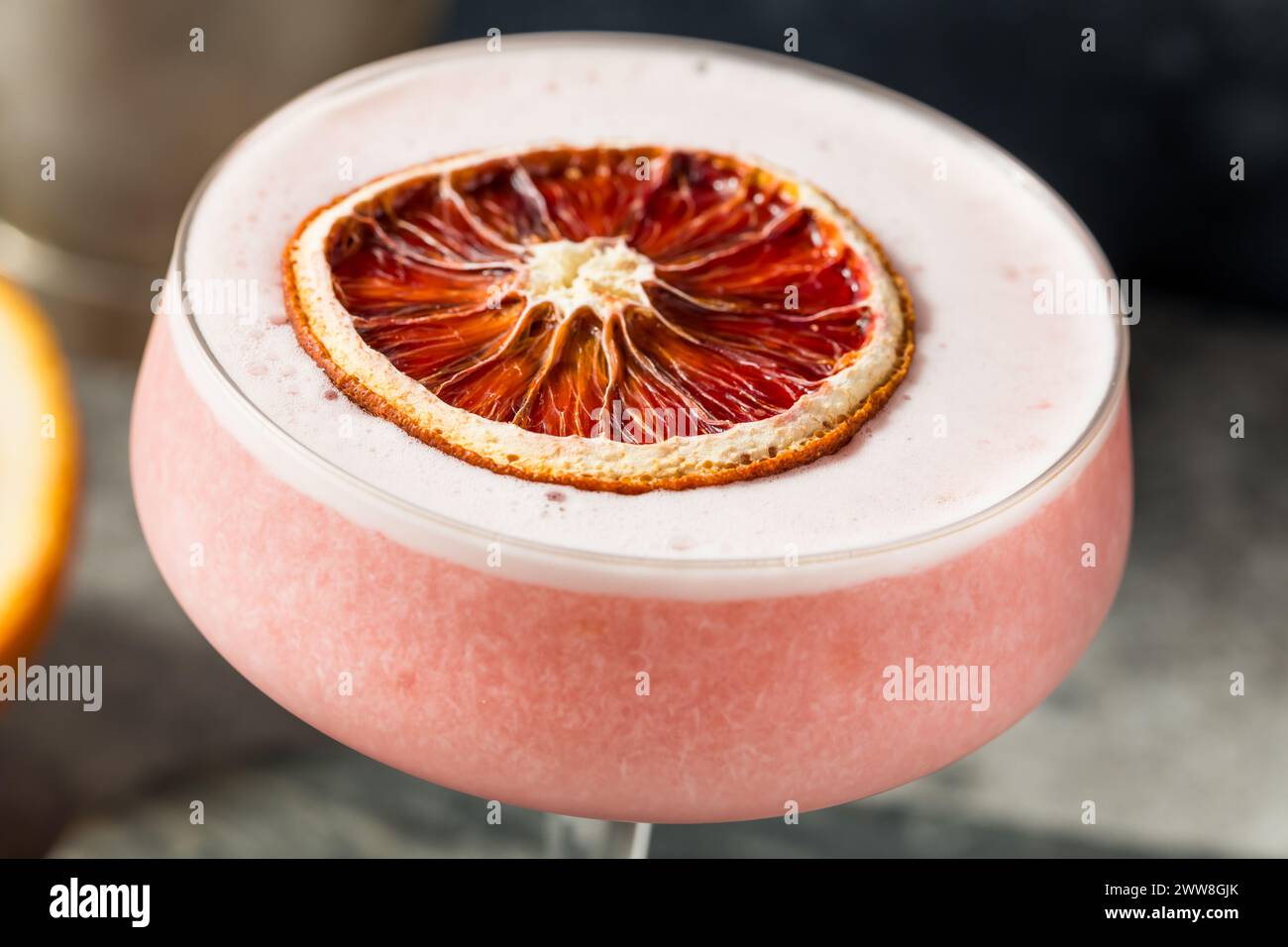 Boozy Foamy Blood Orange Sour Cocktail with Gin Stock Photo - Alamy
