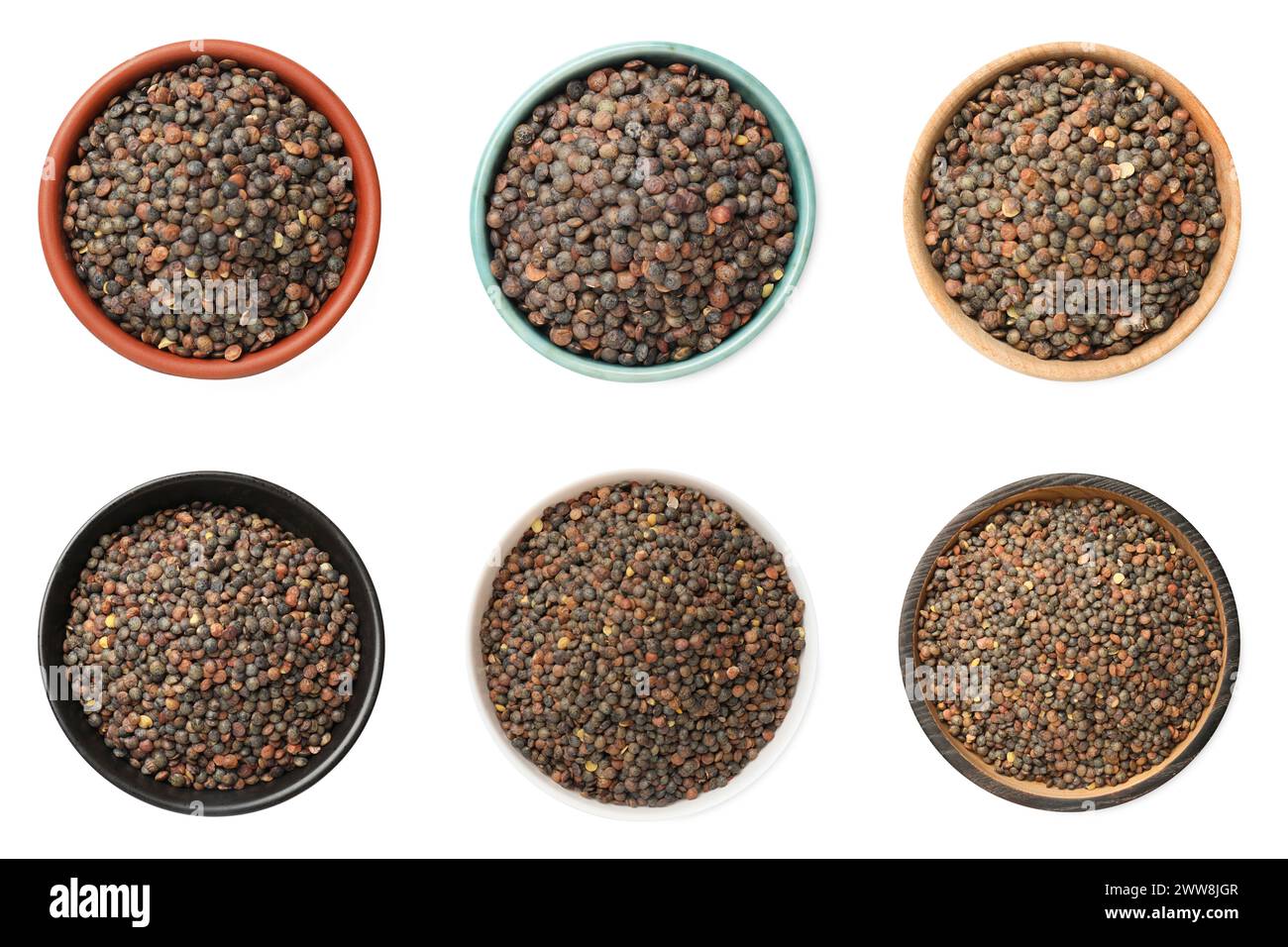 Raw lentils in bowls on white background, top view Stock Photo - Alamy
