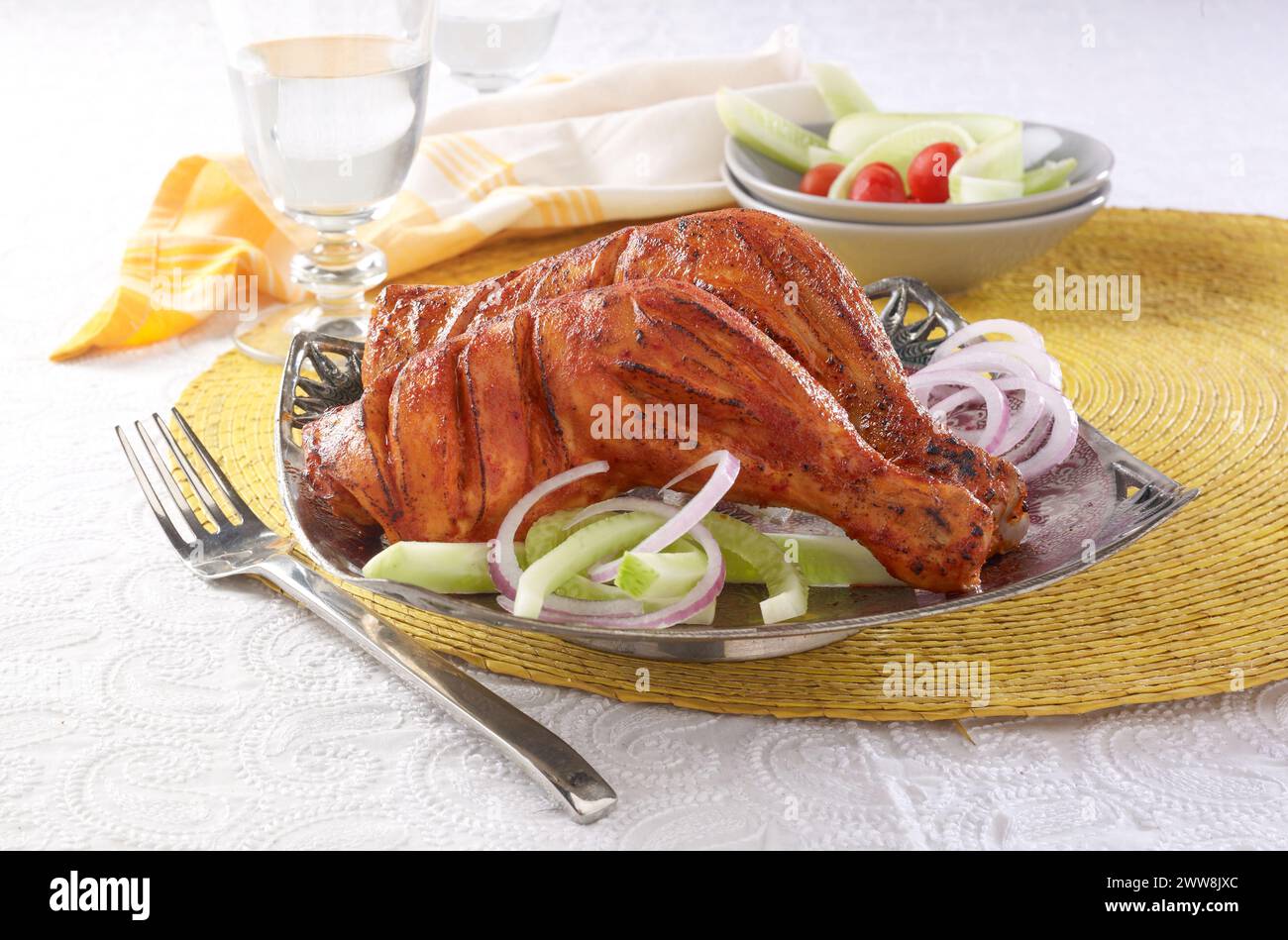 Chicken Tikka. Marinated chicken thigh pieces grilled on charcoals and ...