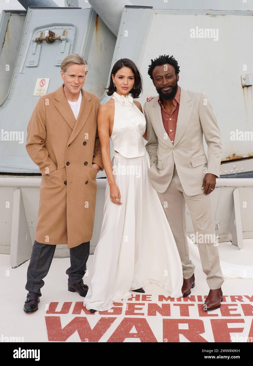 (left to right) Cary Elwes, Eiza Gonzalez, and Babs Olusanmokun attend ...