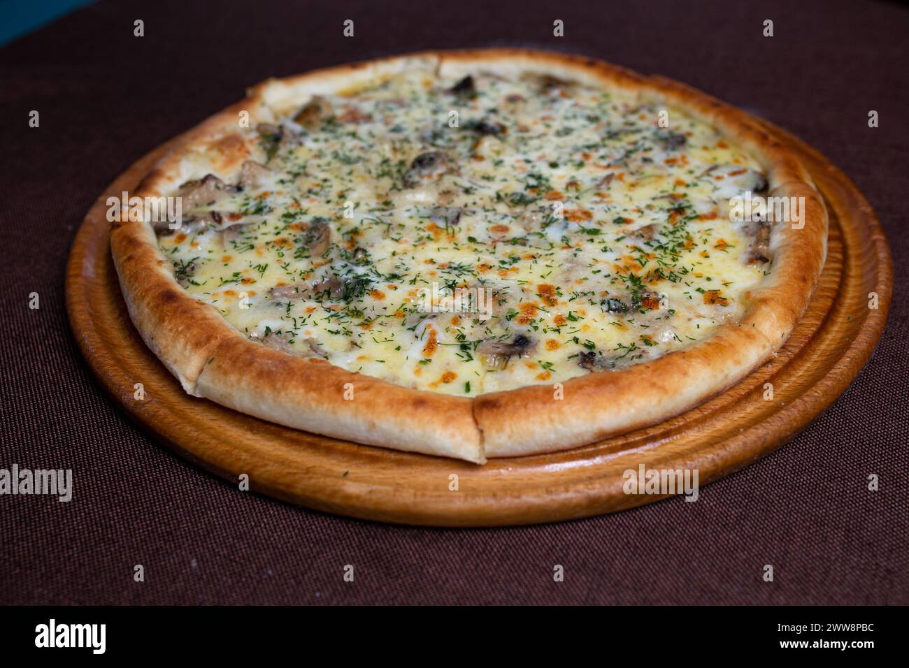 Delicious pizza with a crispy crust, topped with gooey melted cheese ...