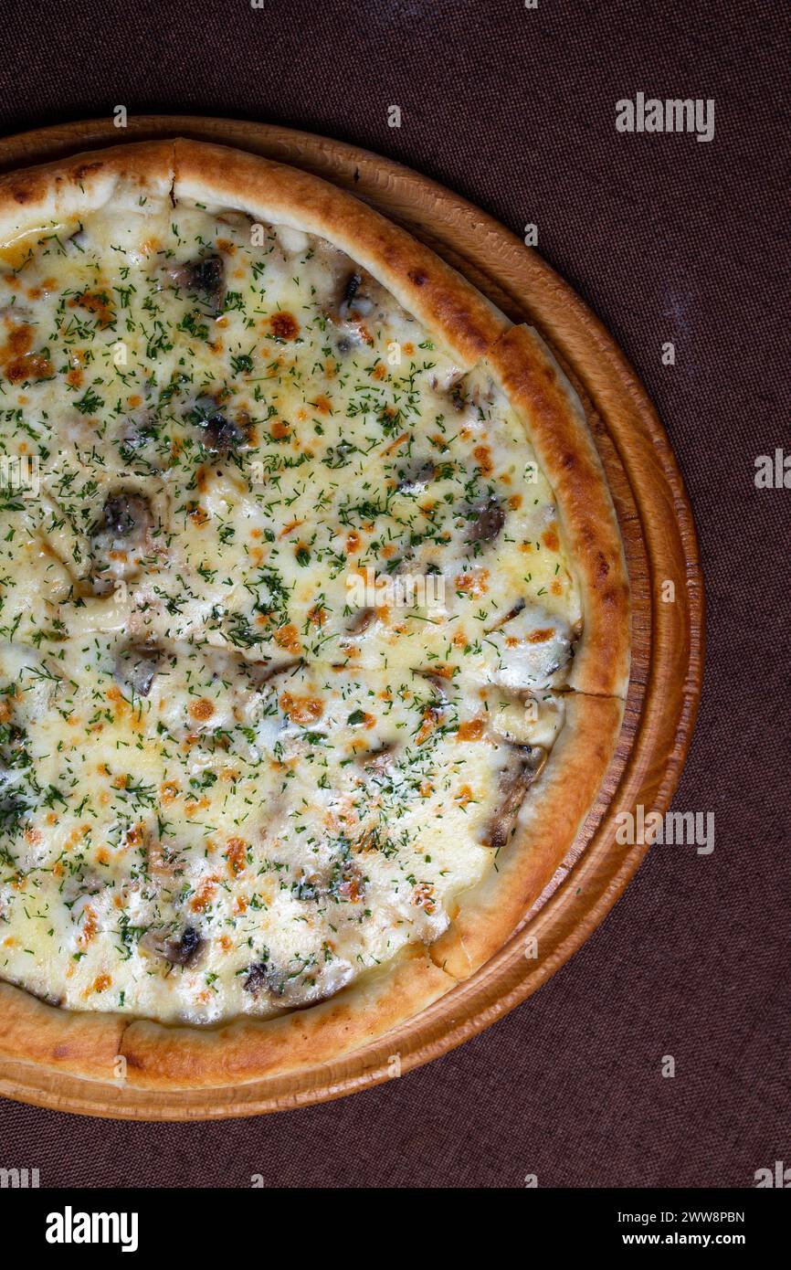 Delicious pizza with a crispy crust, topped with gooey melted cheese ...