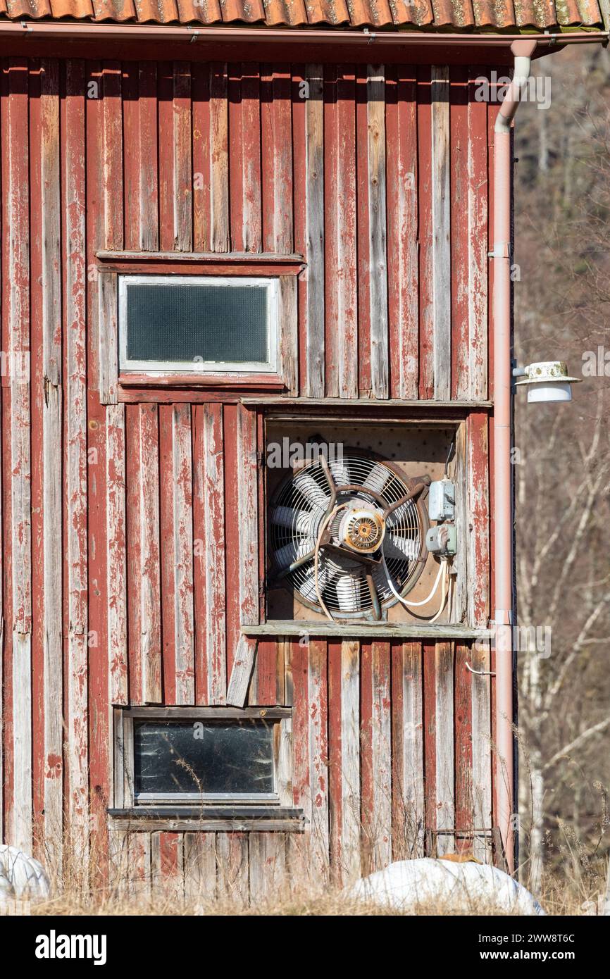Old barn house with ventilation fan and weathered boards Stock Photo ...
