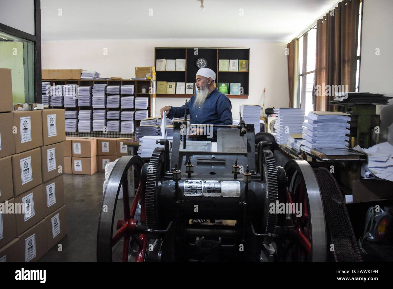 Bandung, West Java, Indonesia. 22nd Mar, 2024. A man operates an old ...