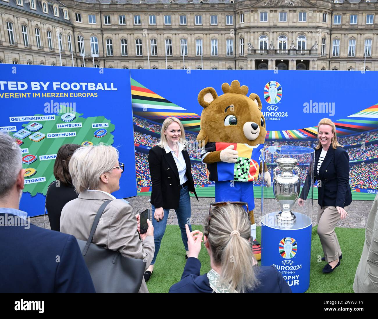 Stuttgart, Germany. 22nd Mar, 2024. Soccer fans have their photo taken ...