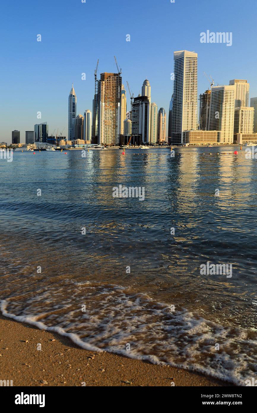 Dubai marina yachts day night hi-res stock photography and images - Alamy