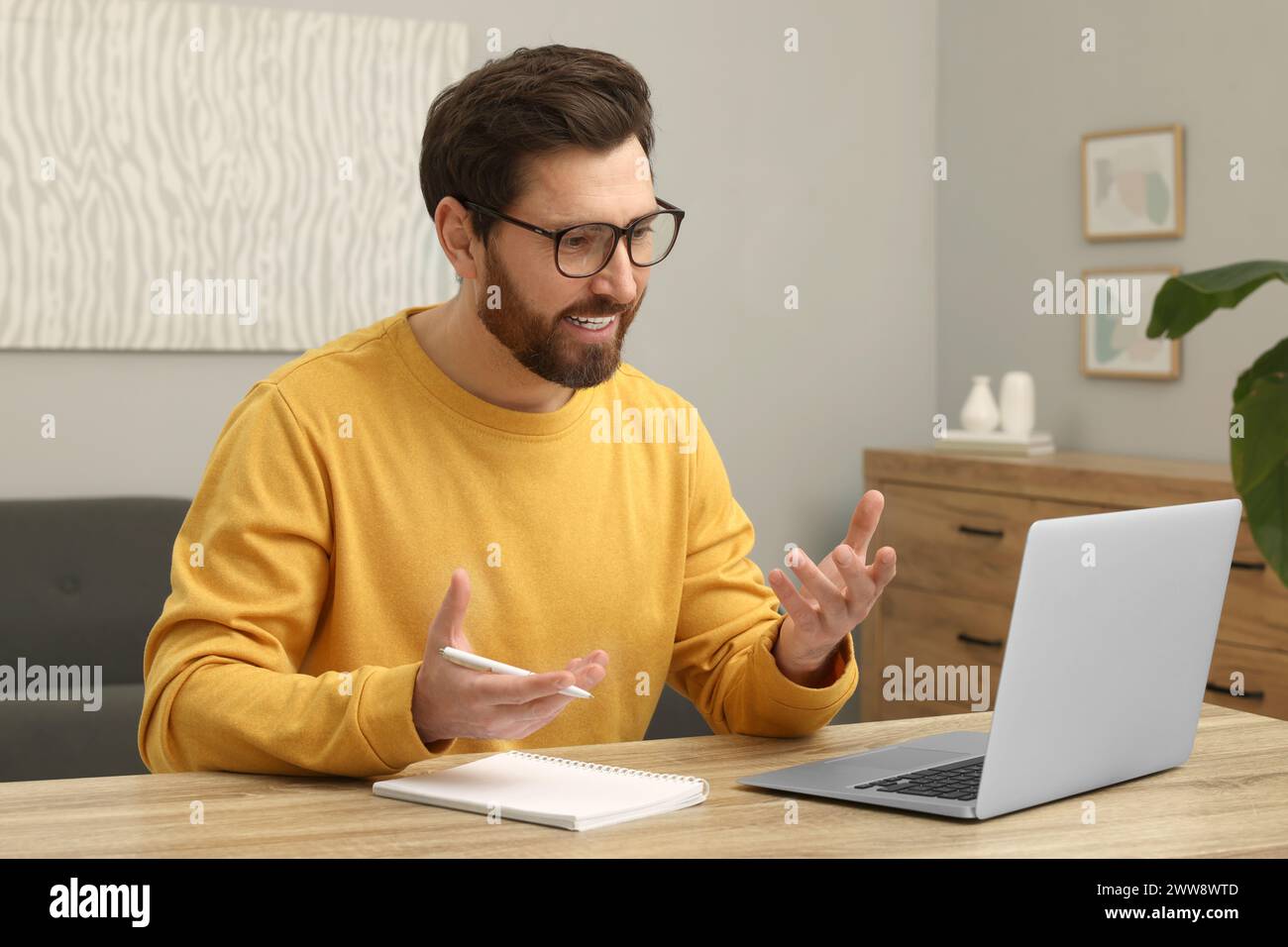 Middle age man having video hi-res stock photography and images - Alamy