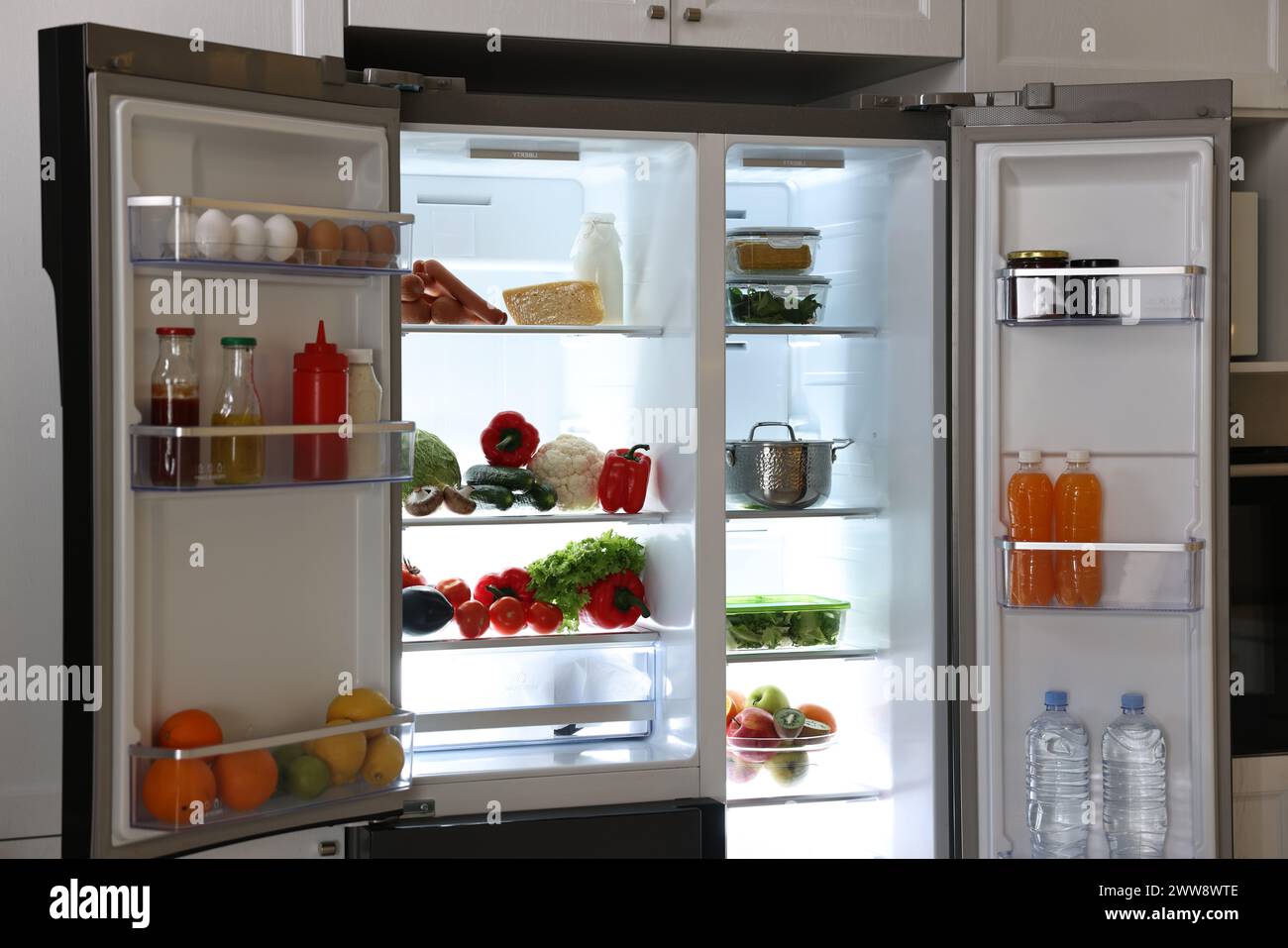 Open refrigerator full products hi-res stock photography and images - Alamy
