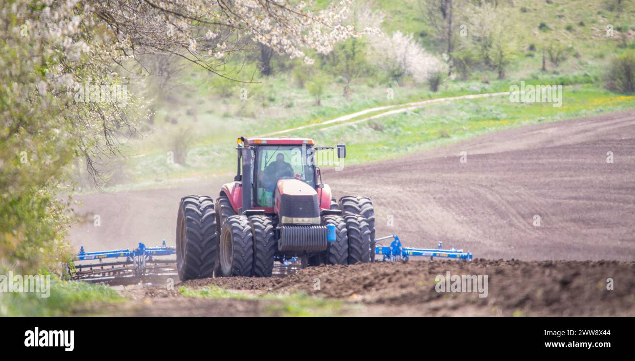 Groundbreaking Work: Tractor Cultivating with Efficiency Stock Photo ...