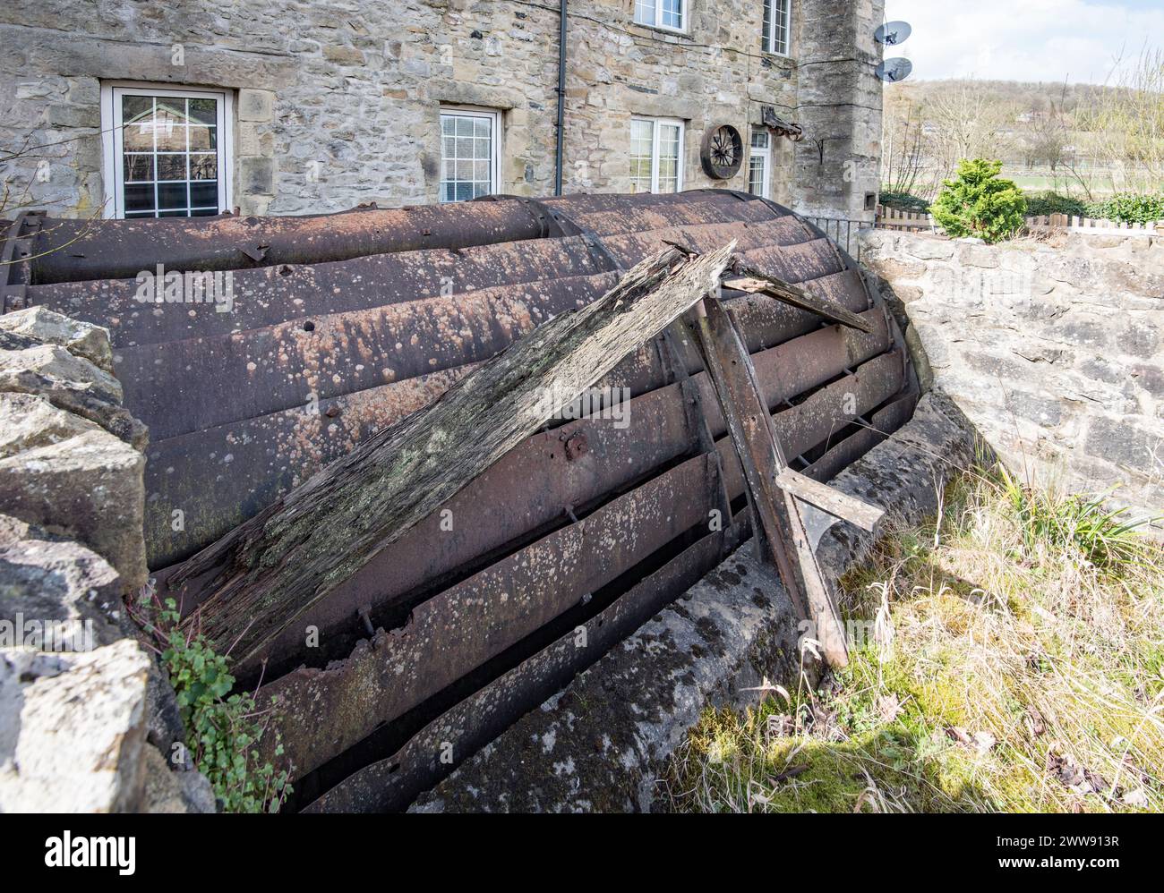 Rusting old water wheel outside former mill settle hi-res stock ...