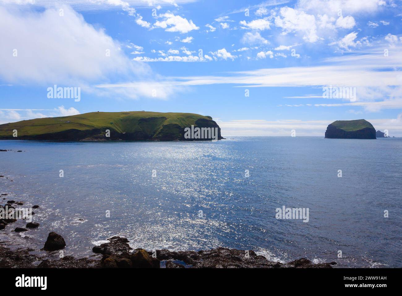 Vestmannaeyjar island beach view with Surtsey island in background ...