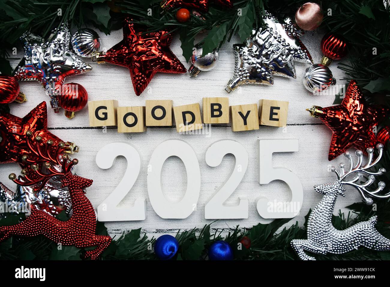 Goodbye 2025 alphabet letters and christmas decoration on wooden background Stock Photo - Alamy