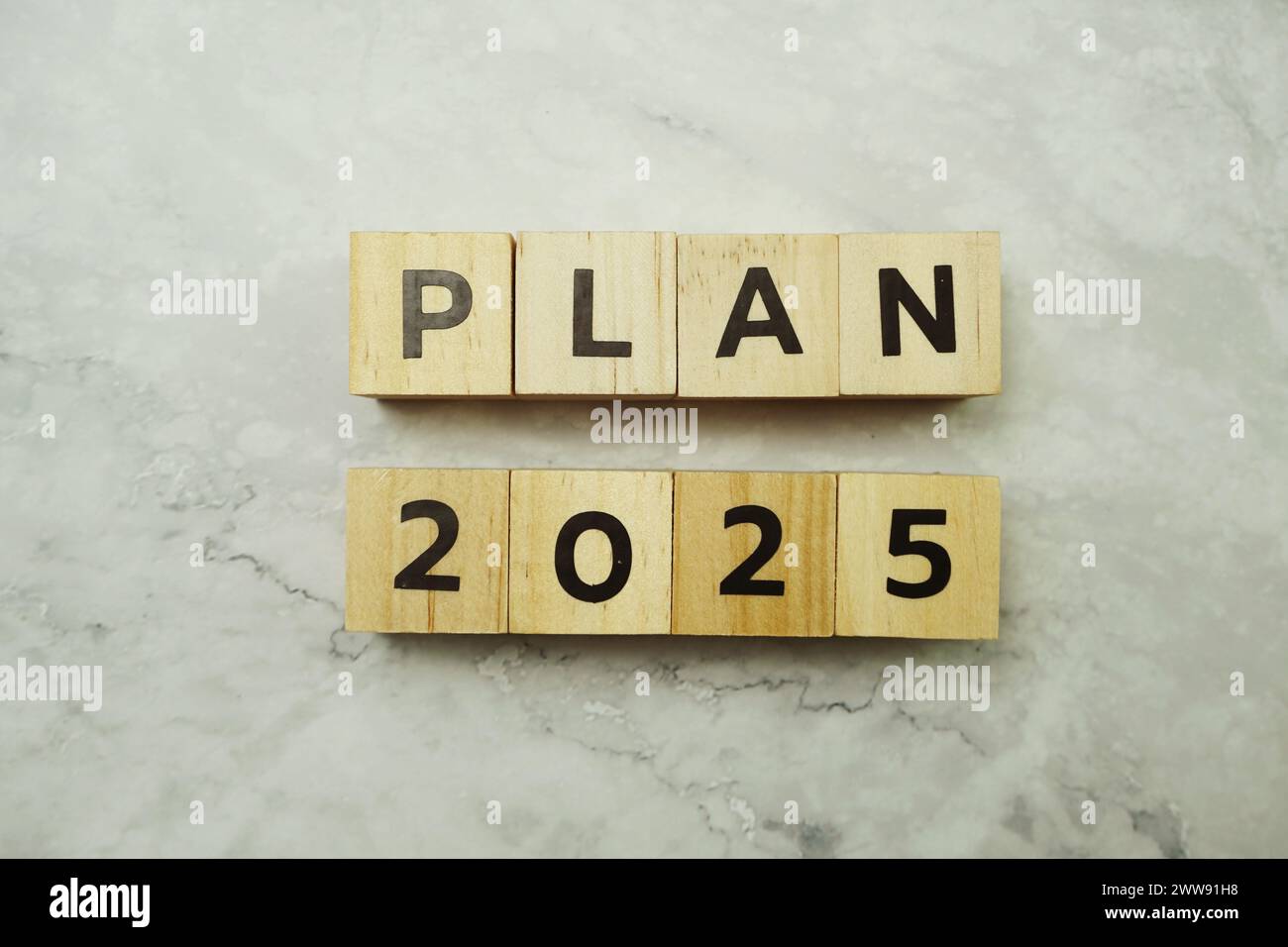 Plan 2025 alphabet letter on marble background Stock Photo - Alamy
