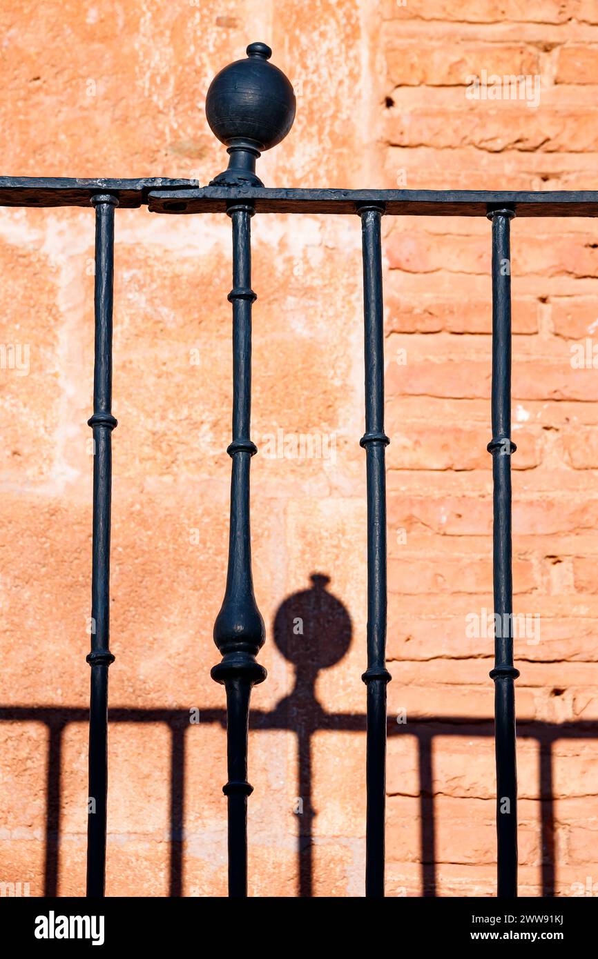 Handrail ball on railing with its shadow in San Carlos del valle Stock ...