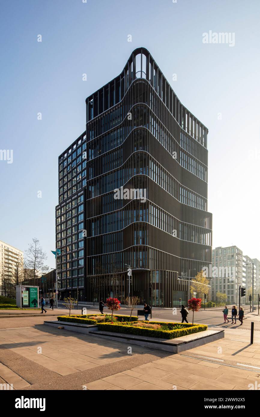 People walking passed the building early in the morning. The Gantry ...