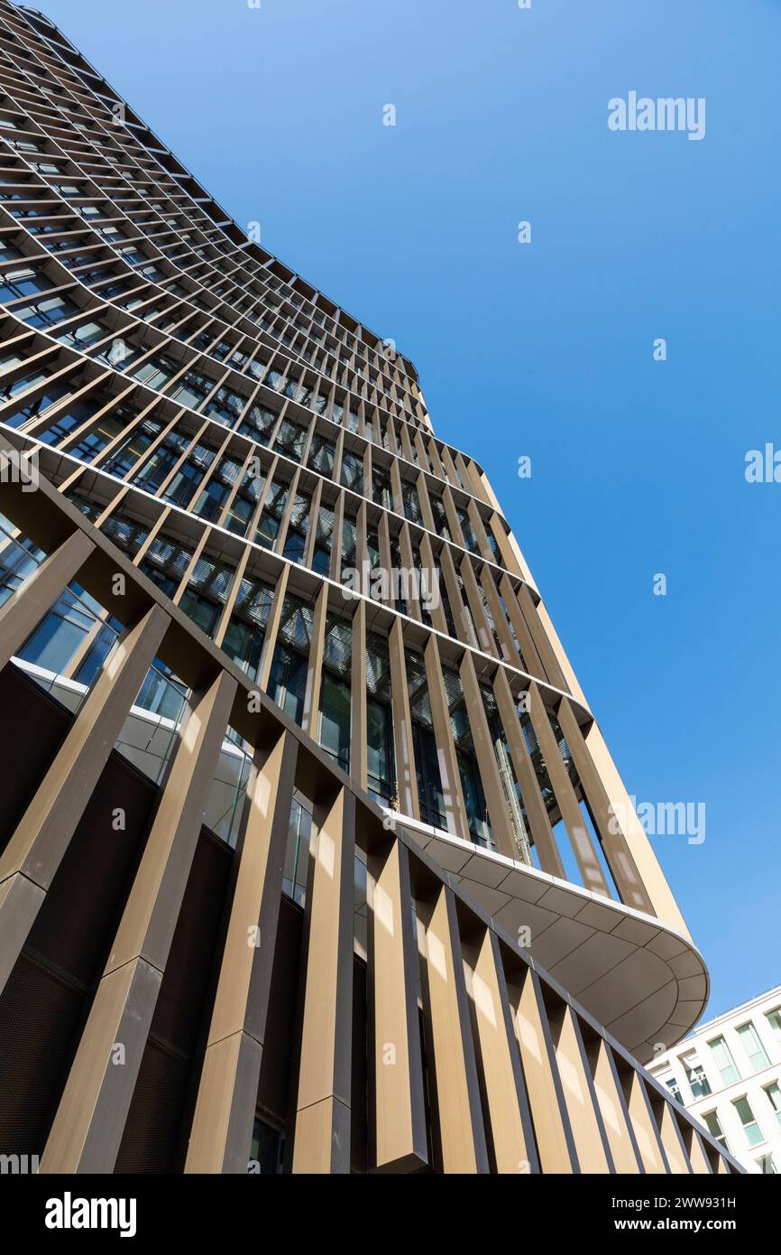 Looking straight up the side of the metal wrapping facade and its ...