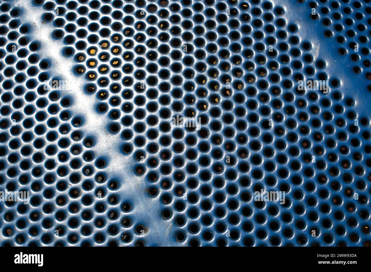 A close up shows the texture and pattern of a playground structure ...