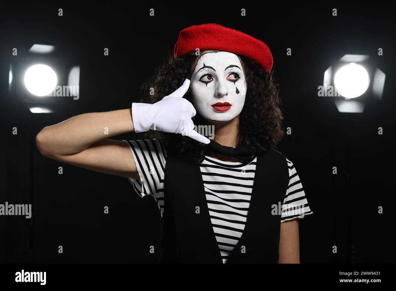 Young woman in mime costume performing on stage Stock Photo - Alamy