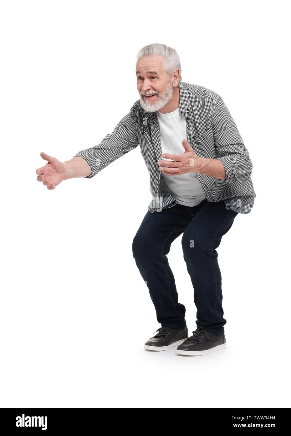 Senior man greeting someone on white background Stock Photo - Alamy