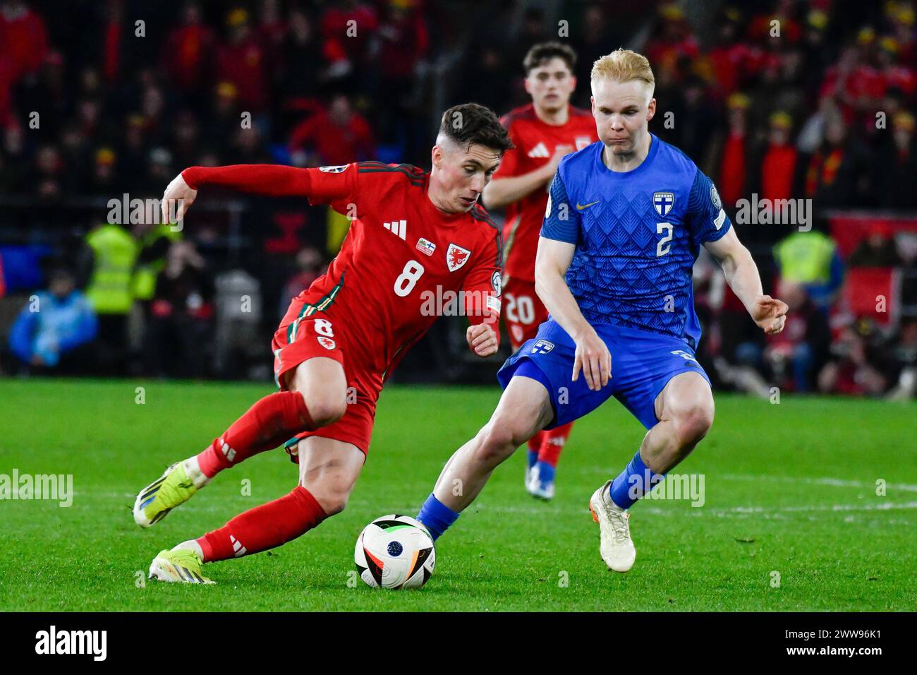 Cardiff, Wales. 21 March 2024. Harry Wilson of Wales under pressure ...