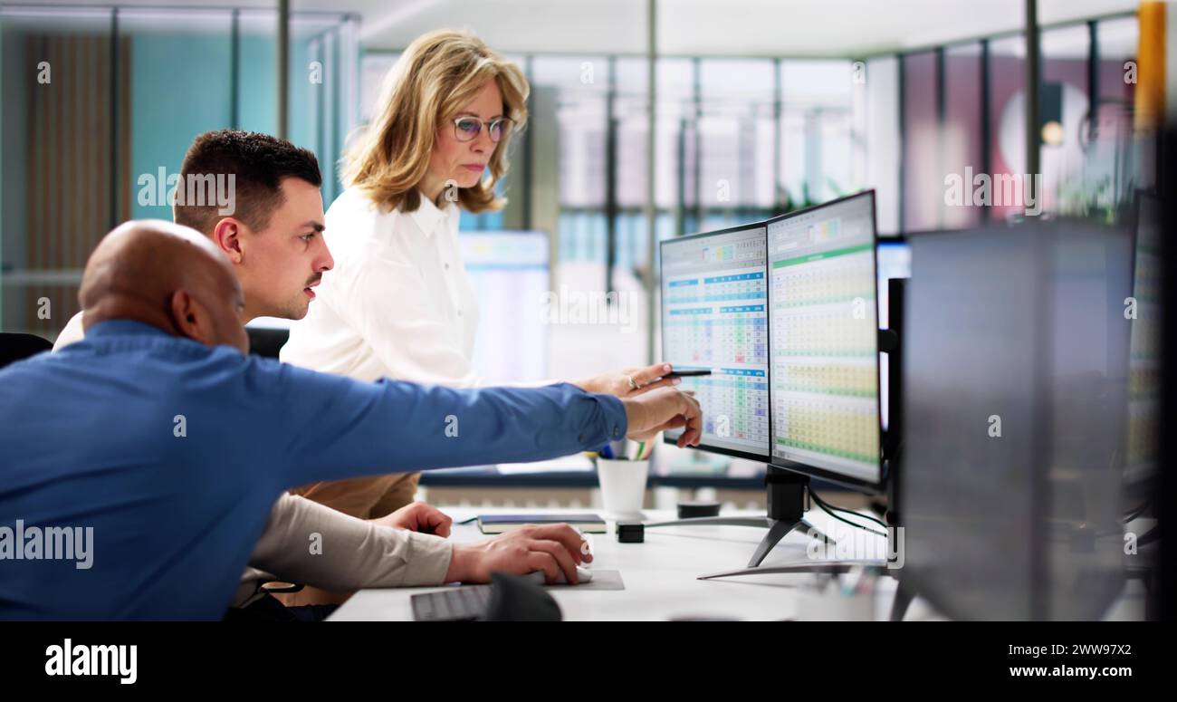 Analyst Employee Working On Spreadsheet Using Desktop Computer Stock ...