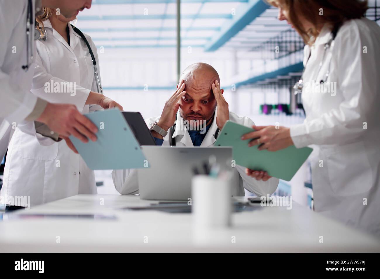 Stress At Workplace In Office. Business Headache Stock Photo - Alamy