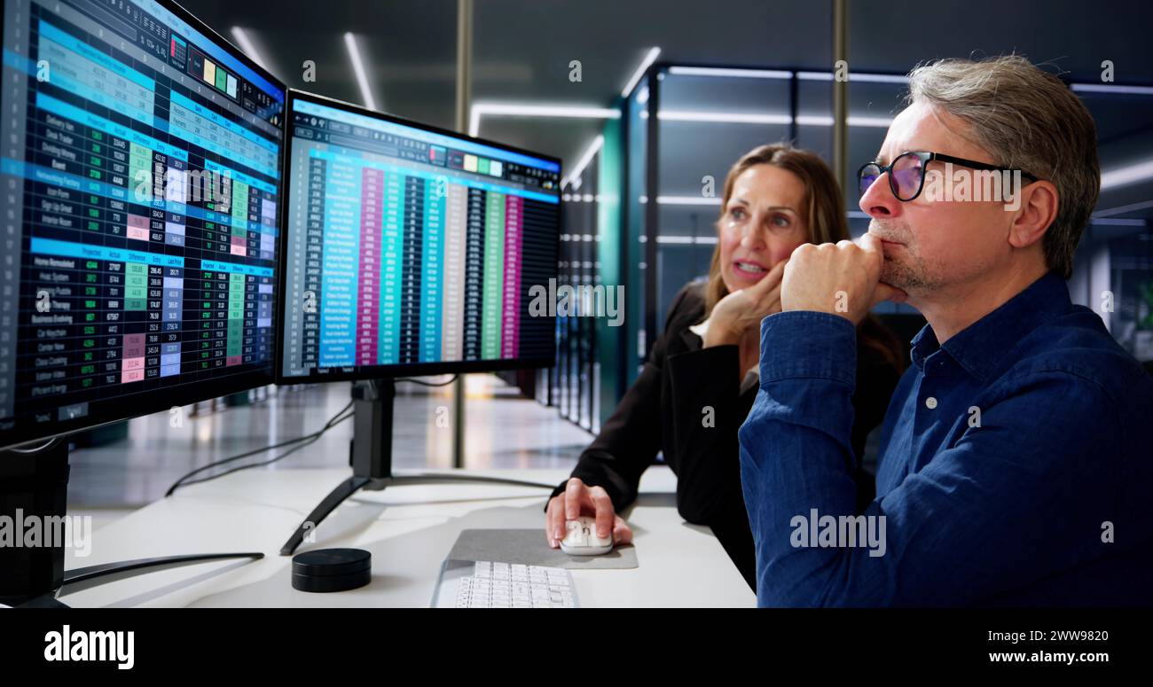 Analyst Employee Working On Spreadsheet Using Desktop Computer Stock ...