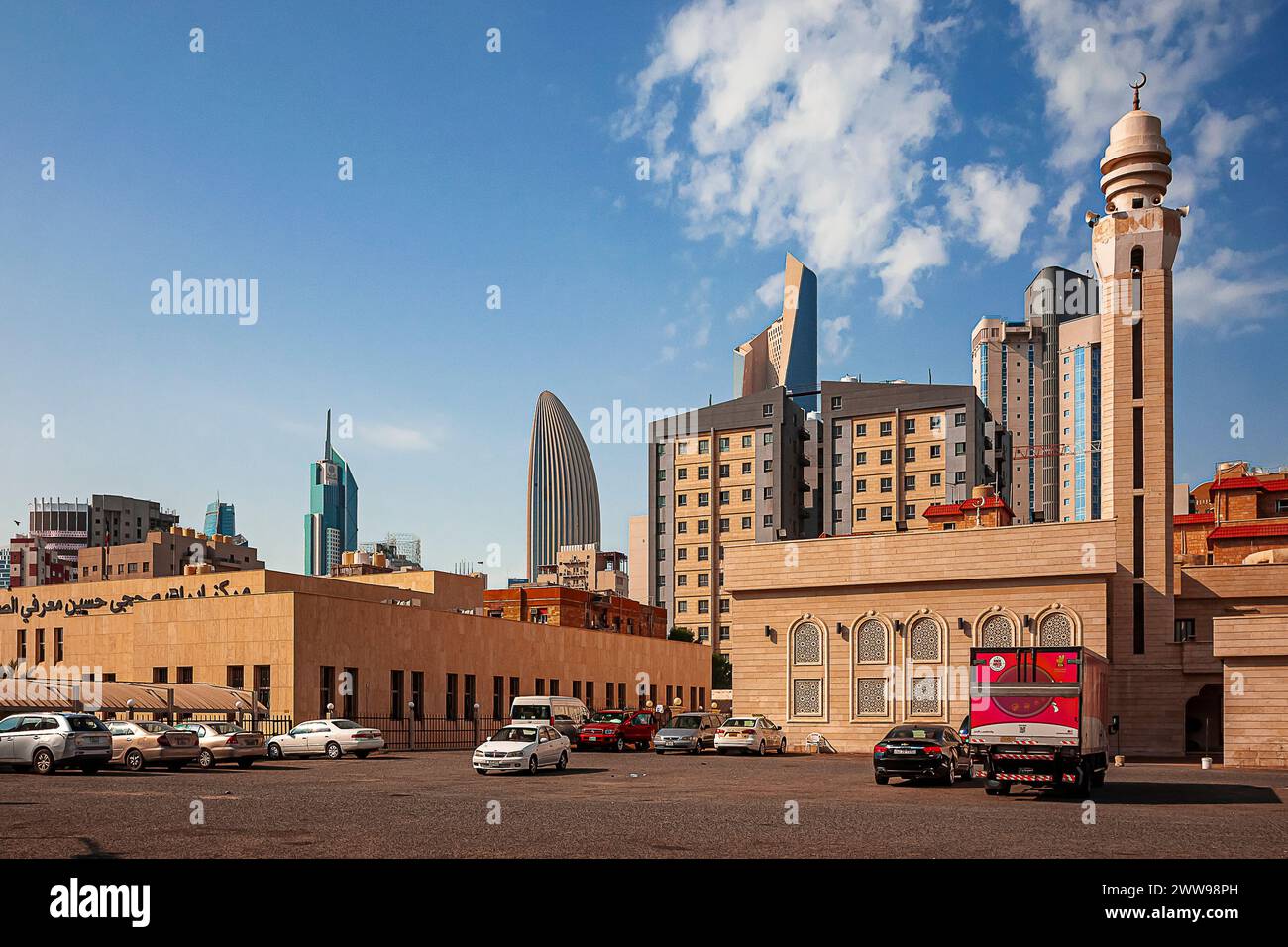 Typical Arab buildings accompany the view of the skyscrapers of Kuwait ...