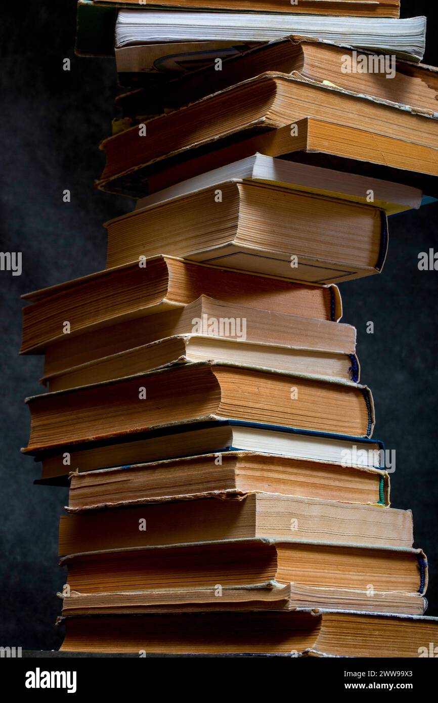 A stack of old books and notebooks on the table Stock Photo - Alamy