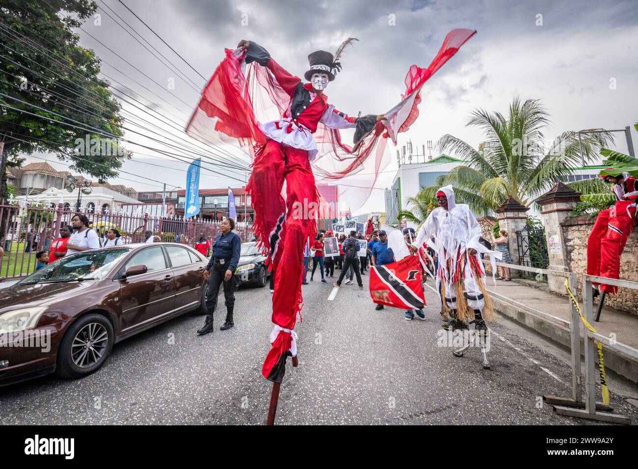 World Steel Pan Day celebration Moko Jumbie parade Stock Photo - Alamy