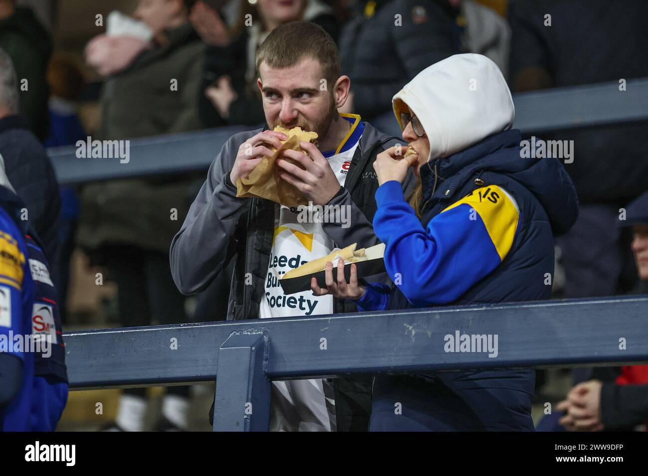 Leeds fans have a bite to eat before the game during the Betfred Challenge Cup Sixth Round match ...